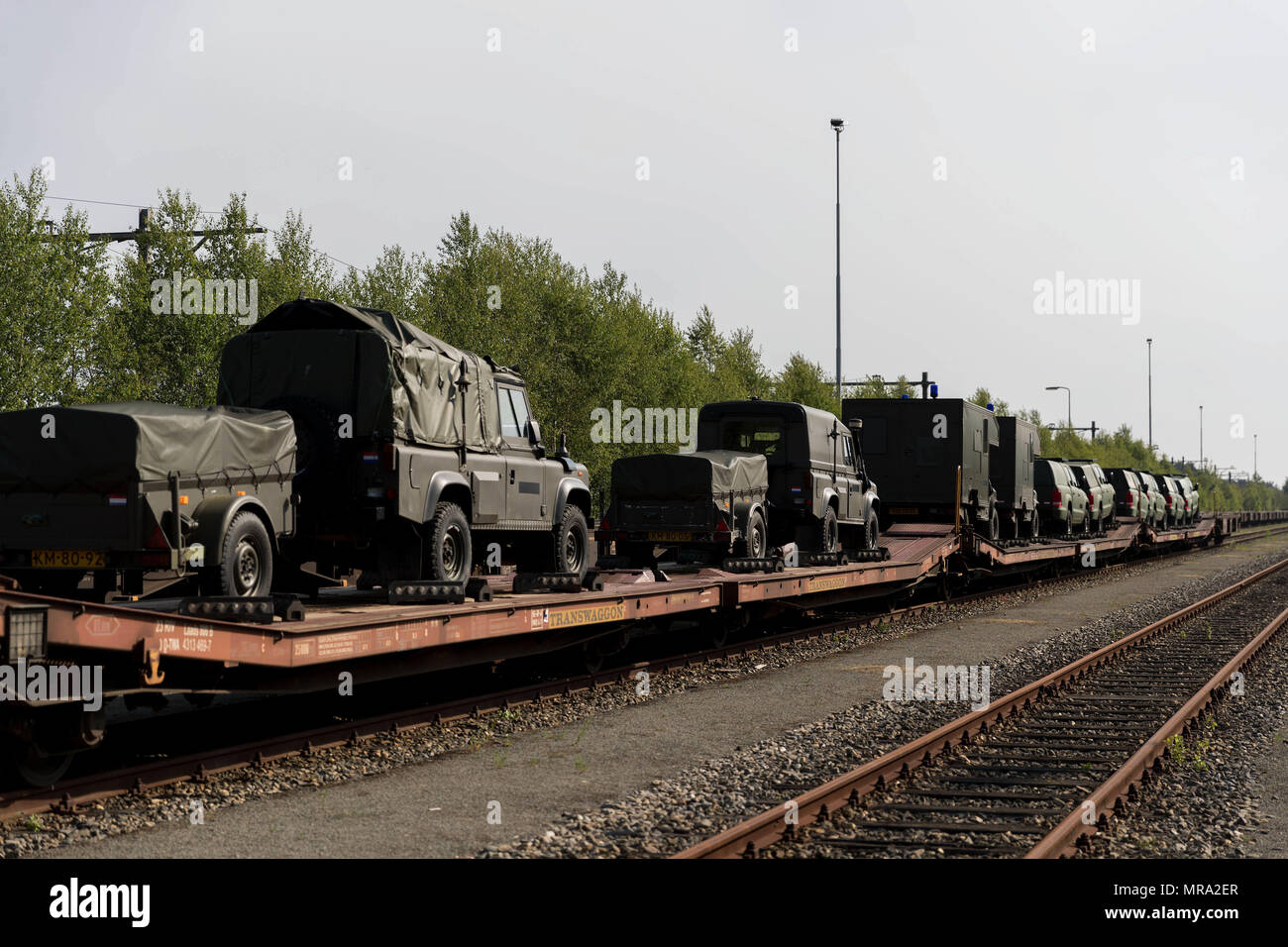 Dutch Marines in cooperation of MOVECON units load their equipment on ...