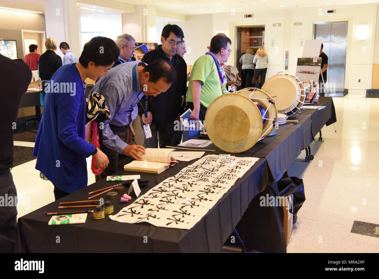 NSWCCD employees view a collection of writings and instruments on ...