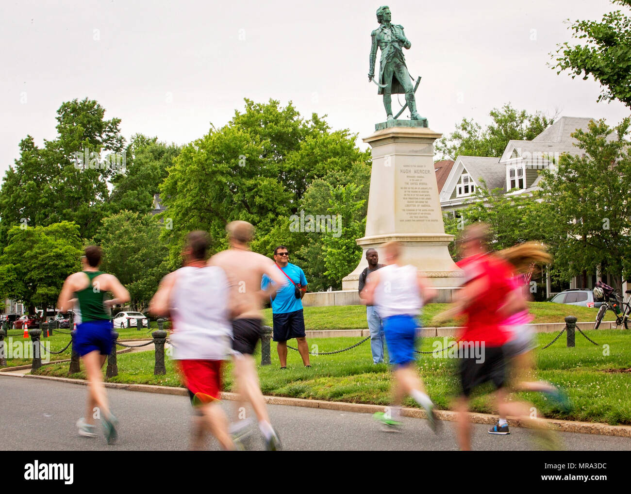 Runners pass the General Hugh Mercer Monument during the 10th Annual ...