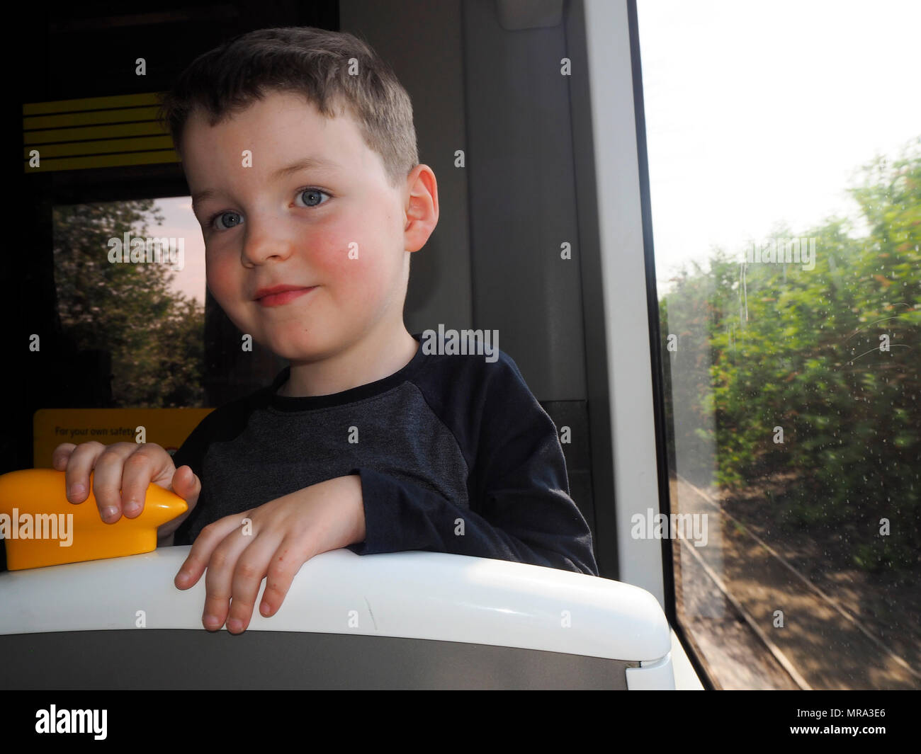 Kids on tram train hi-res stock photography and images - Alamy