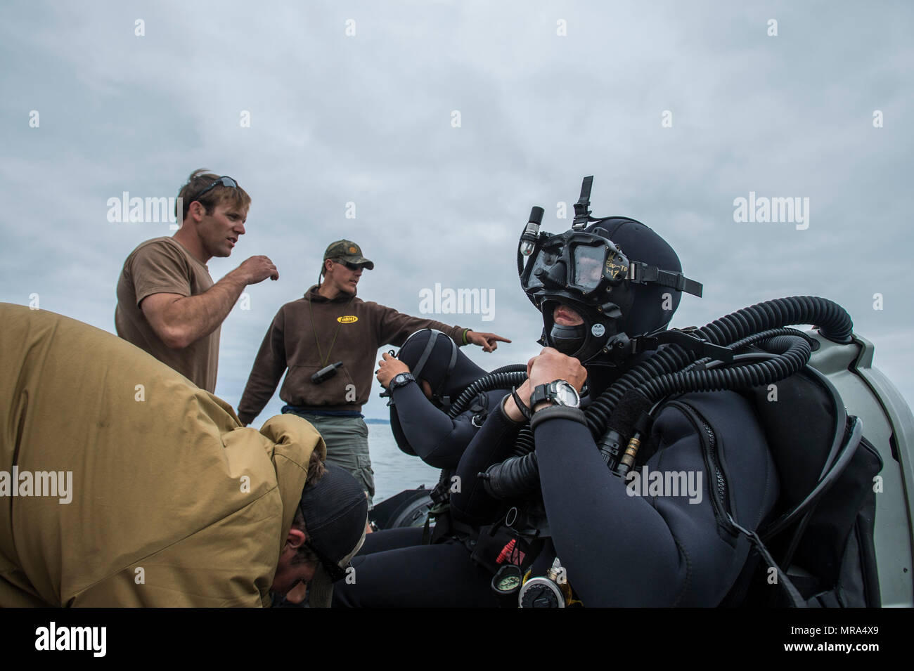 U.S. Navy Sailors assigned to Explosive Ordnance Disposal Group One ...