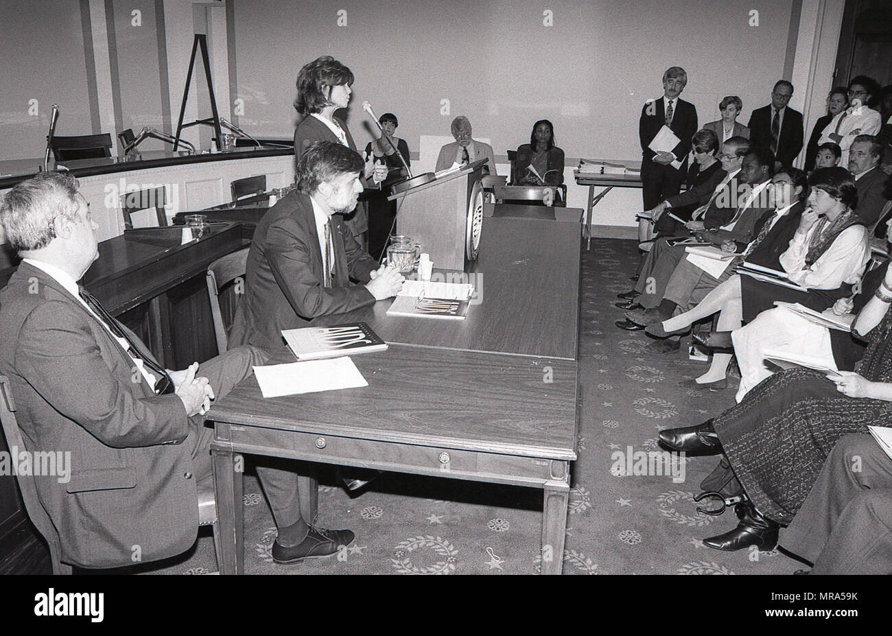 USAID REPORT TO CONGRESS - USAID member speaking from podium Stock ...