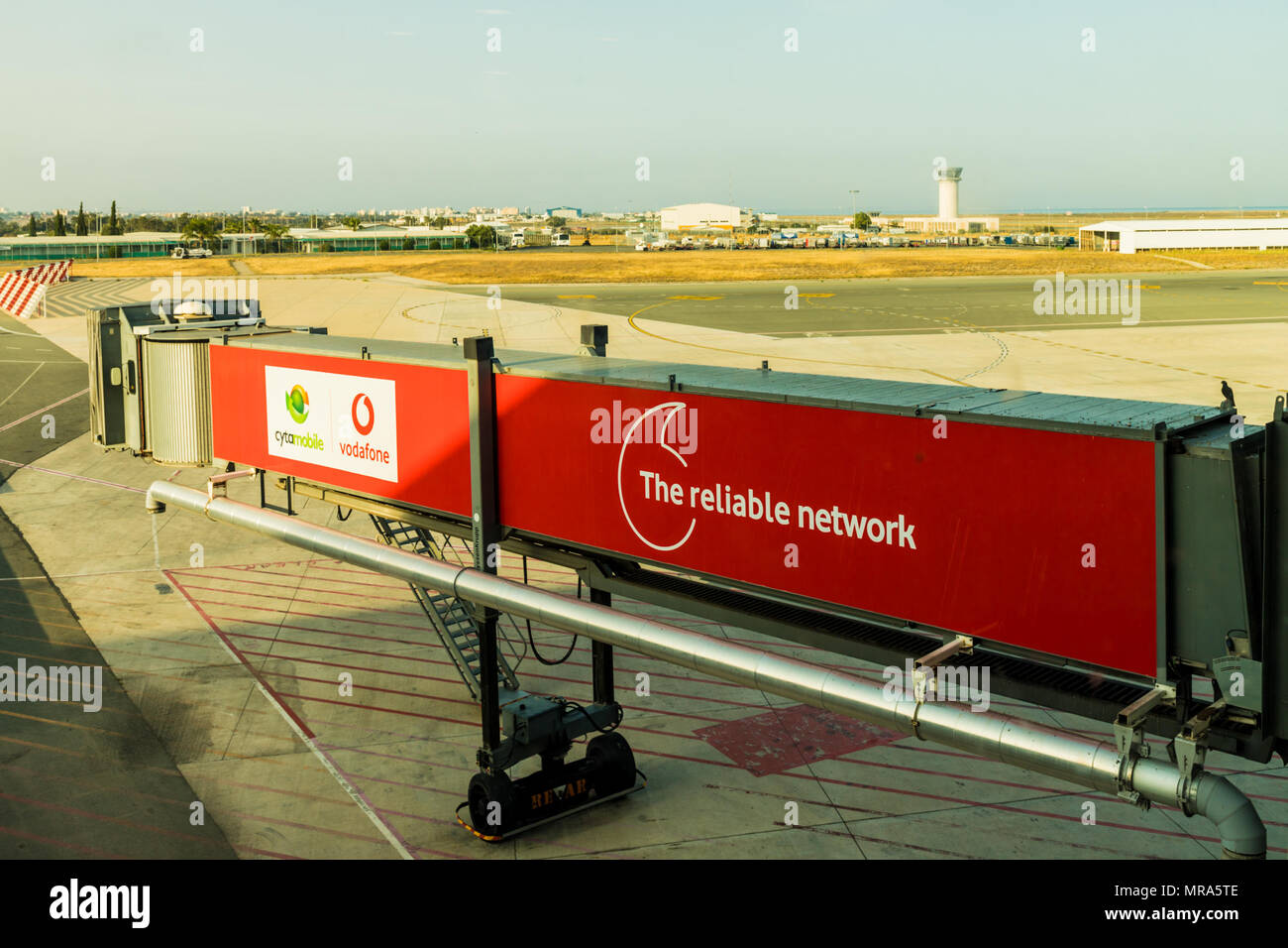 Airplane at the passenger boarding bridge on the runway hi-res stock ...