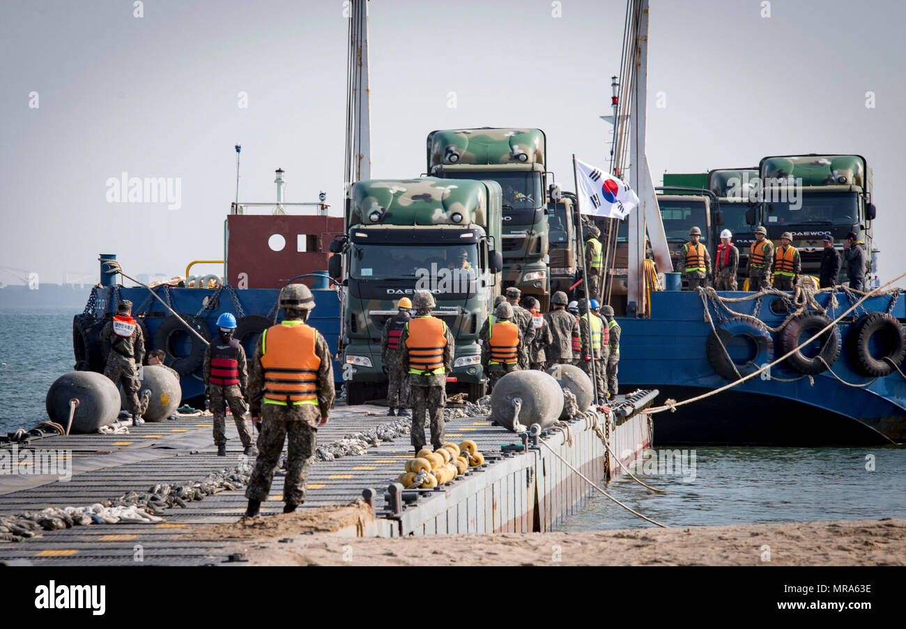 ROK Sailors and Soldiers coordinate the offload of vehicles from Navy ...