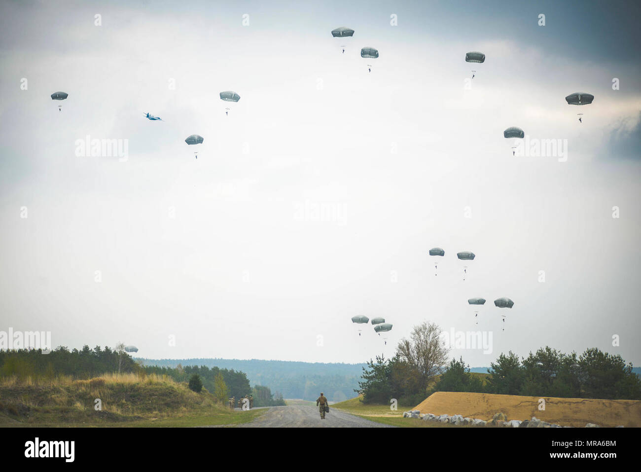U.S. Army Paratroopers assigned to 4th Battalion, 319th Airborne Field Artillery Regiment, 173rd ...