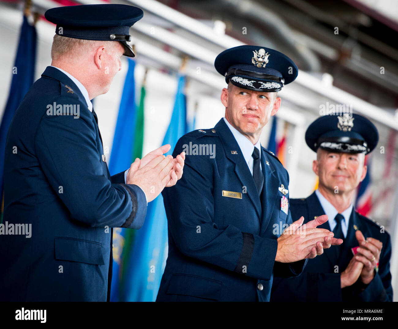 Brig. Gen. Evan Dertien glances over to his new boss, Maj. Gen. David ...