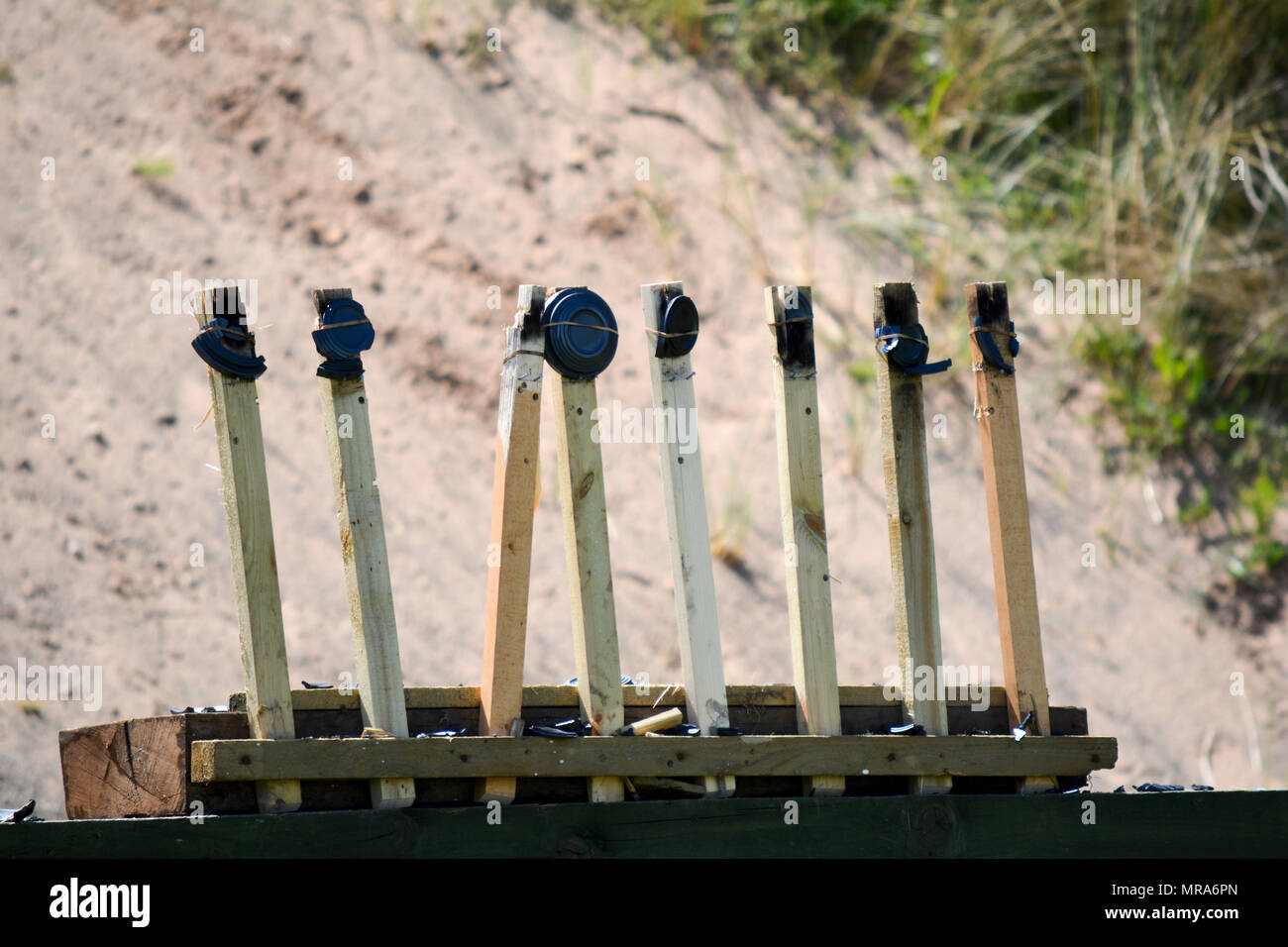Tiles that were used for a pistol shooting competition stand with one ...