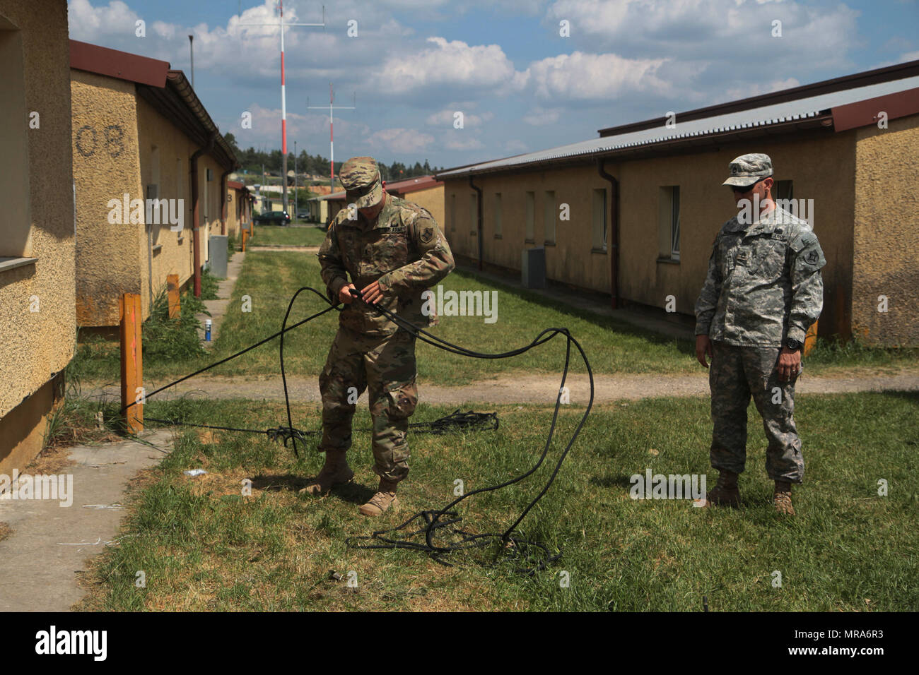 1st Lt Zachary Grove, a sapper platoon leader, and Sgt 1st Class Austin ...