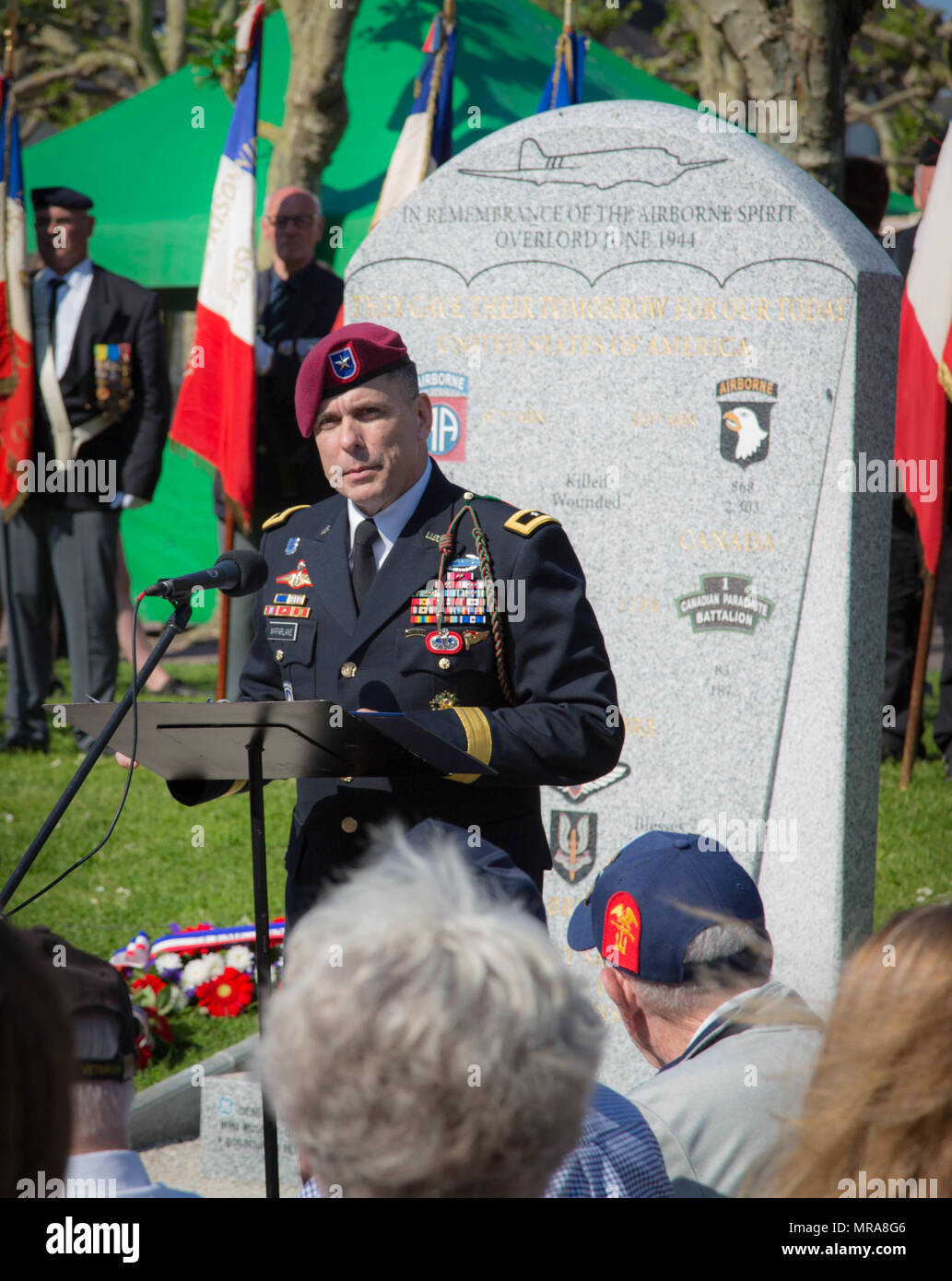 Brigadier General Matthew McFarlane speaks at the 73rd D-Day ceremony ...
