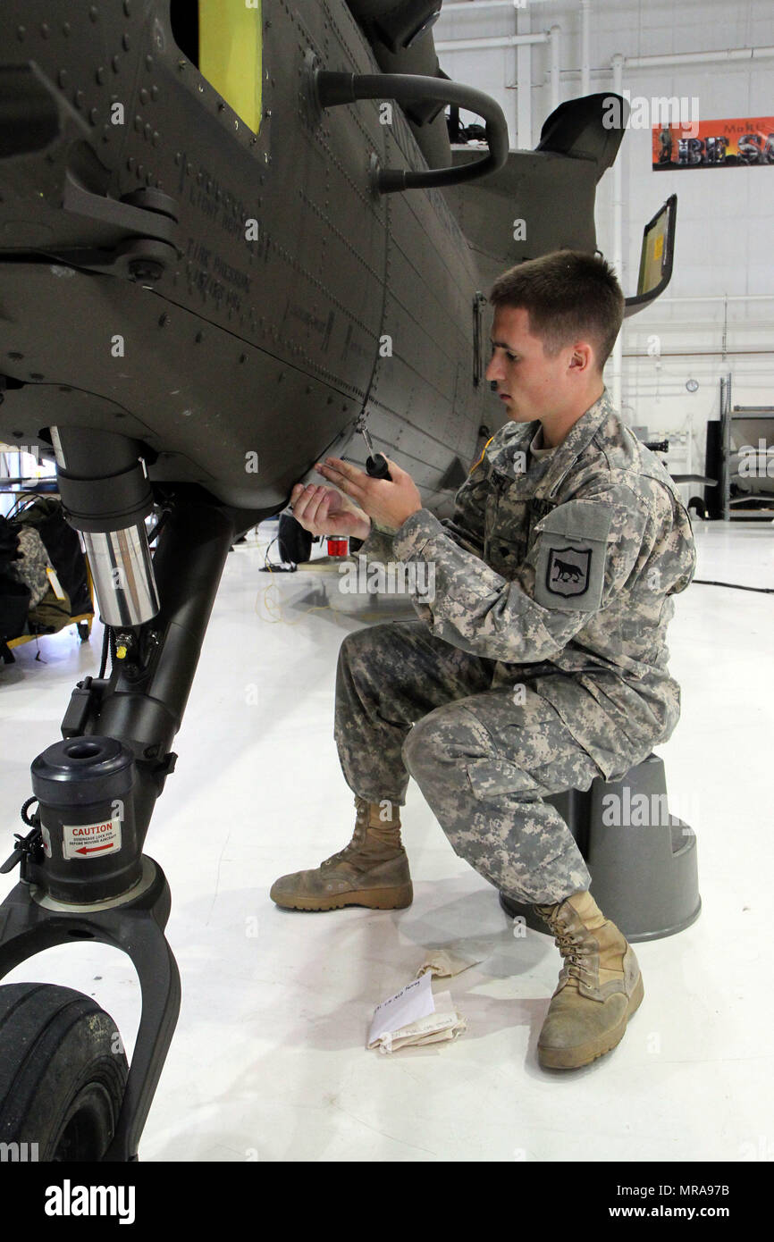 U.S. Army Spc. Kyle Pfeifle, a general mechanic with the South Dakota ...