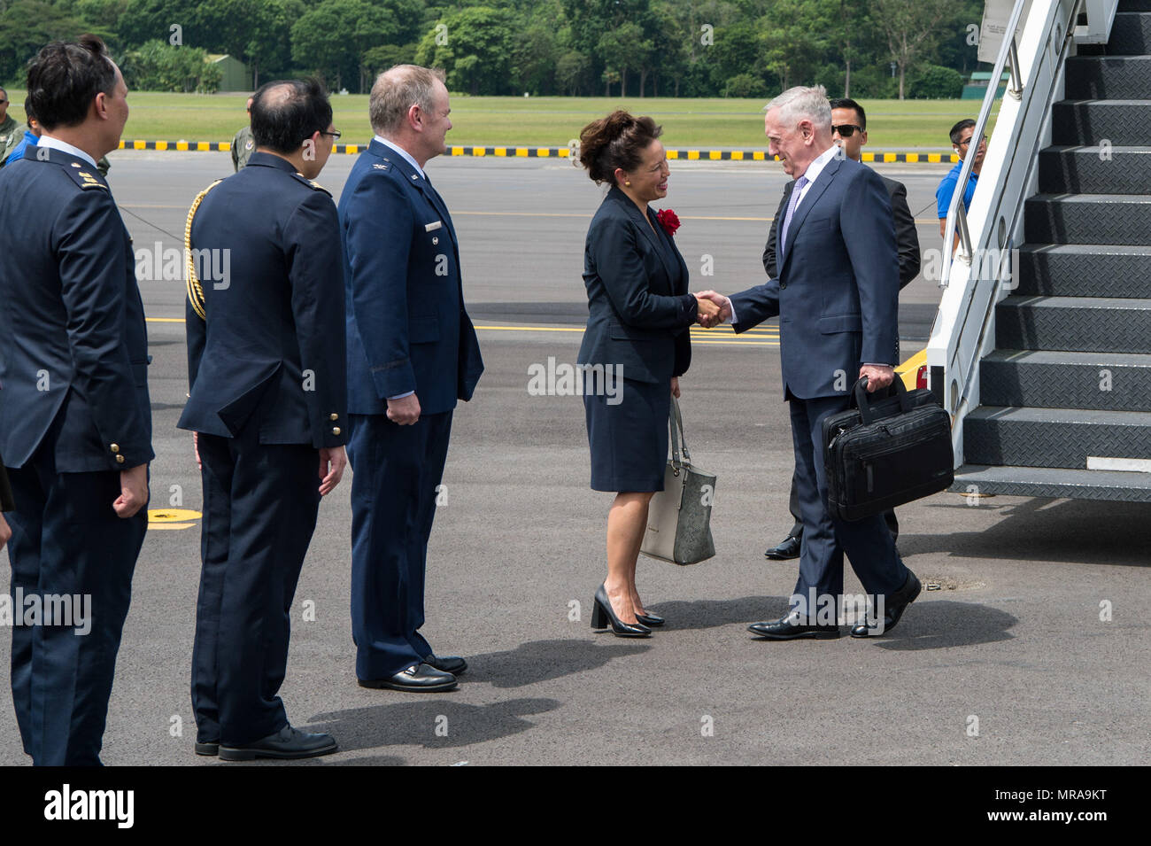 Secretary of Defense Jim Mattis is met by Chargé d’Affaires Stephanie ...