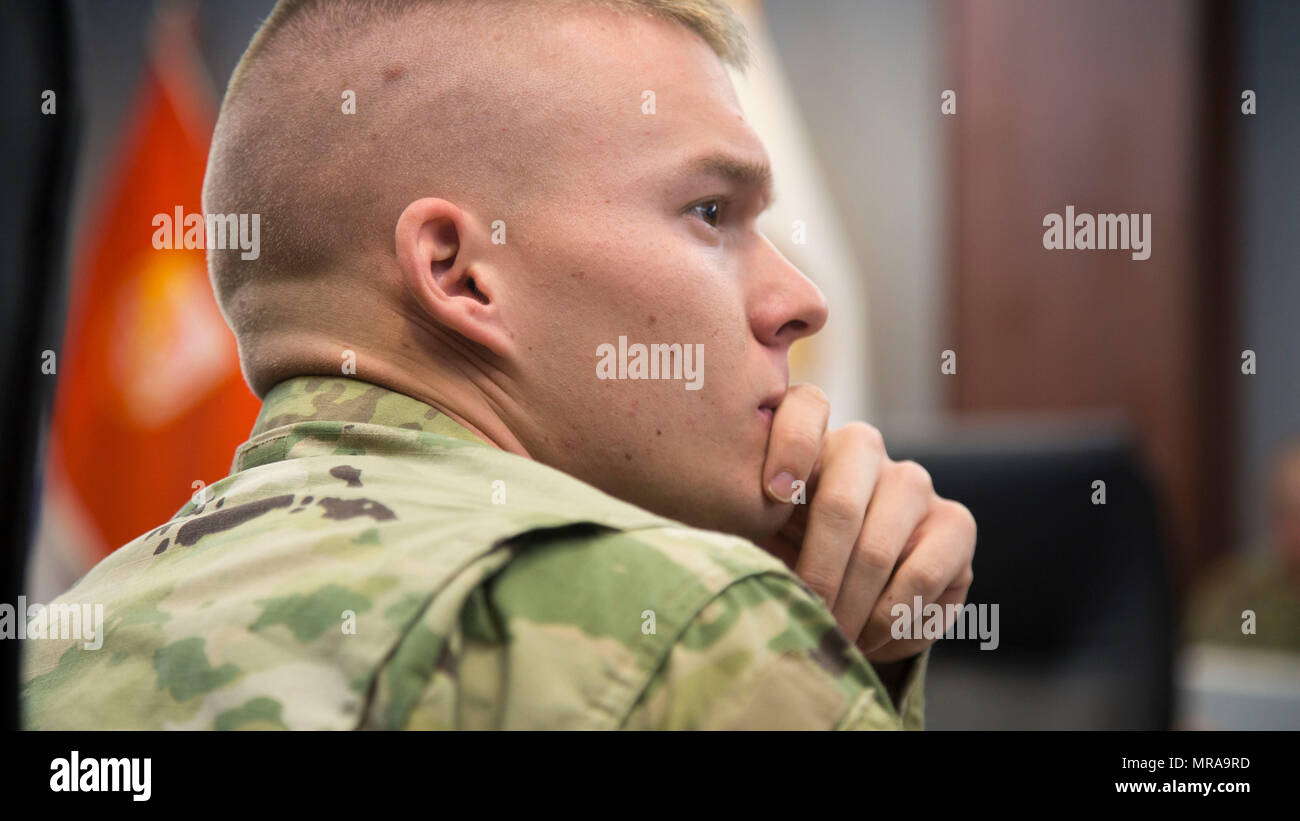 U.S. Army Spc. Justin M. Carter, assigned to 275th Signal Company ...
