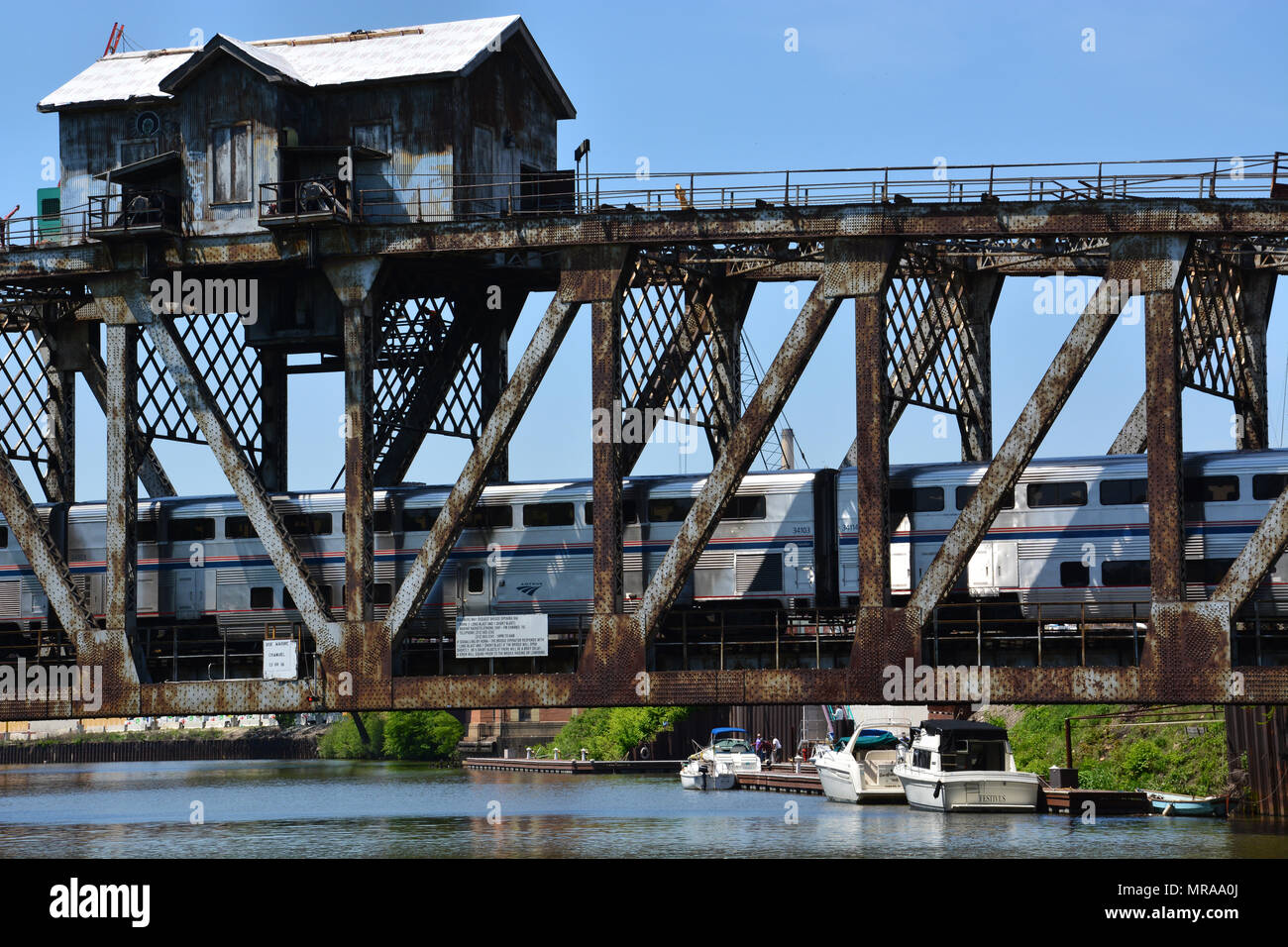 An Amtrack train crosses the Chicago River on the Canal Street railroad ...