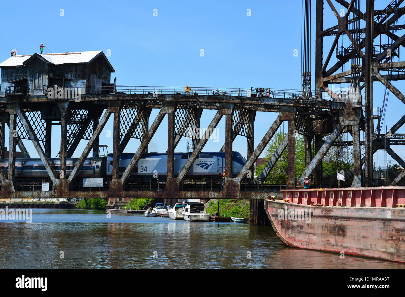 A commercial barge on the Chicago River south of downtown waits for an ...