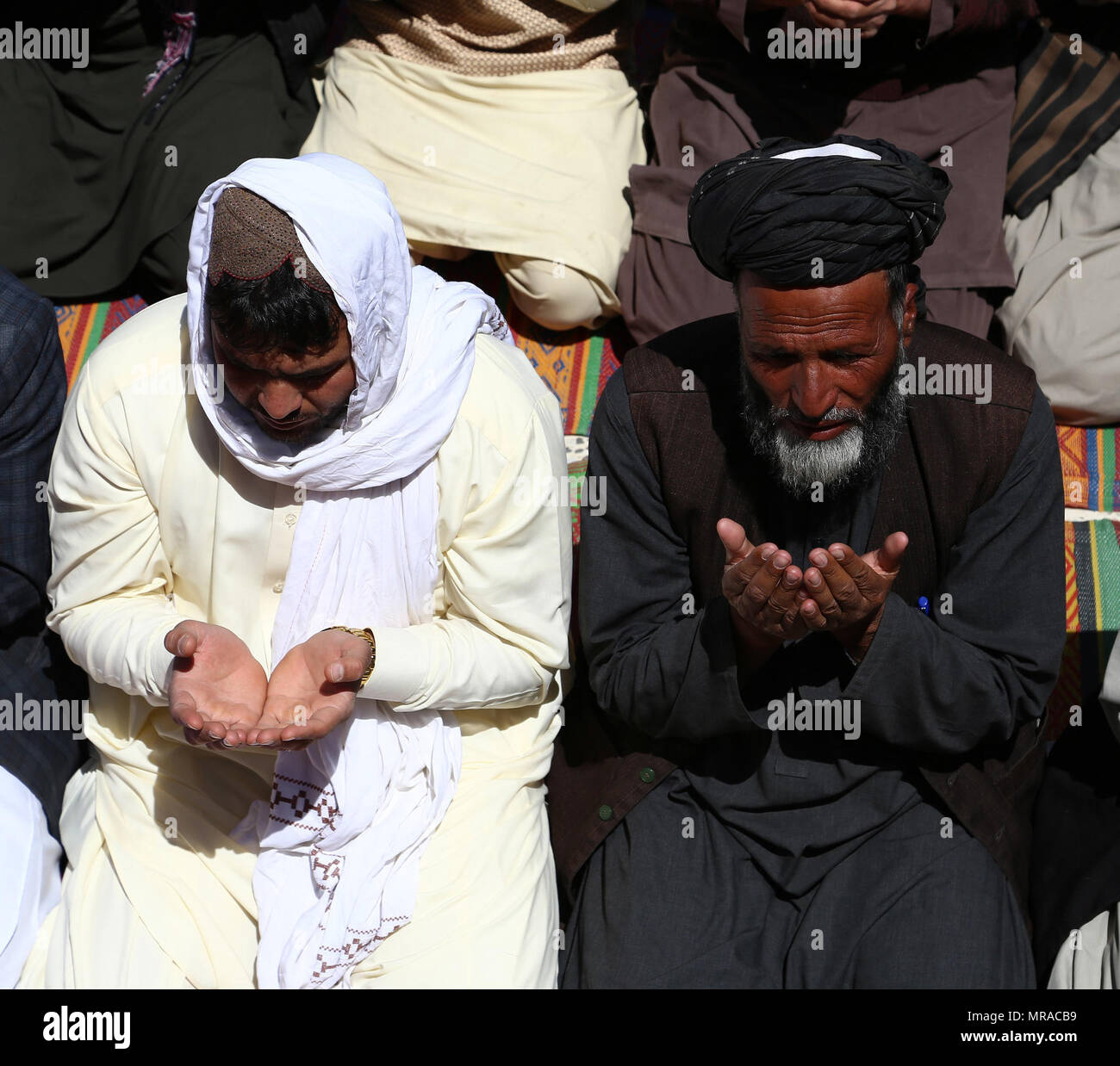 Ghazni, Afghanistan. 25th May, 2018. Muslims pray at a mosque during ...