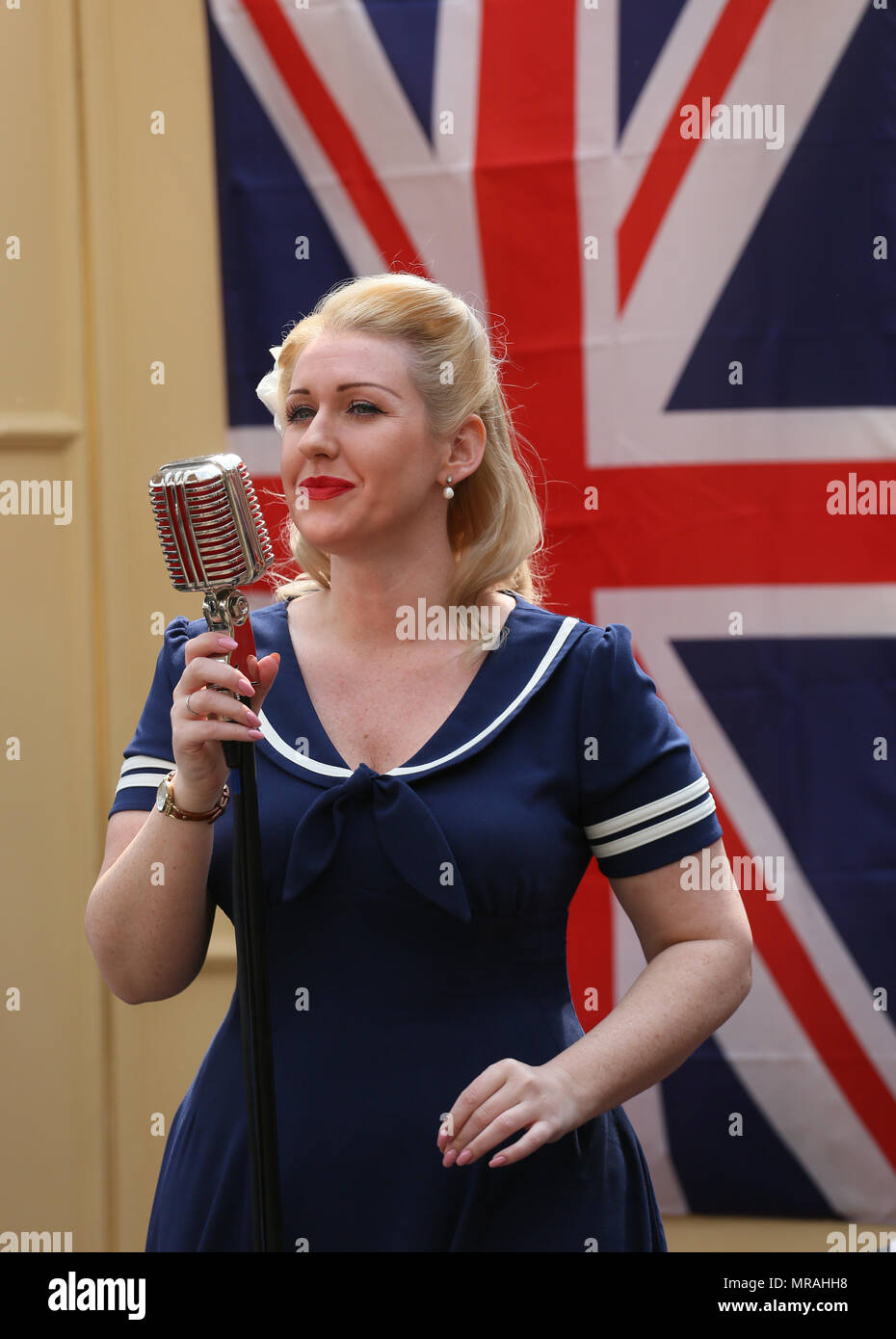 Bury, UK, 26 May 2018. A singer at the East Lancashire Railway, Bury ...