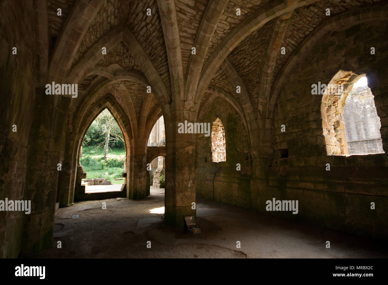 Gothic architecture in the interior of the monastery ruins in Fountains ...