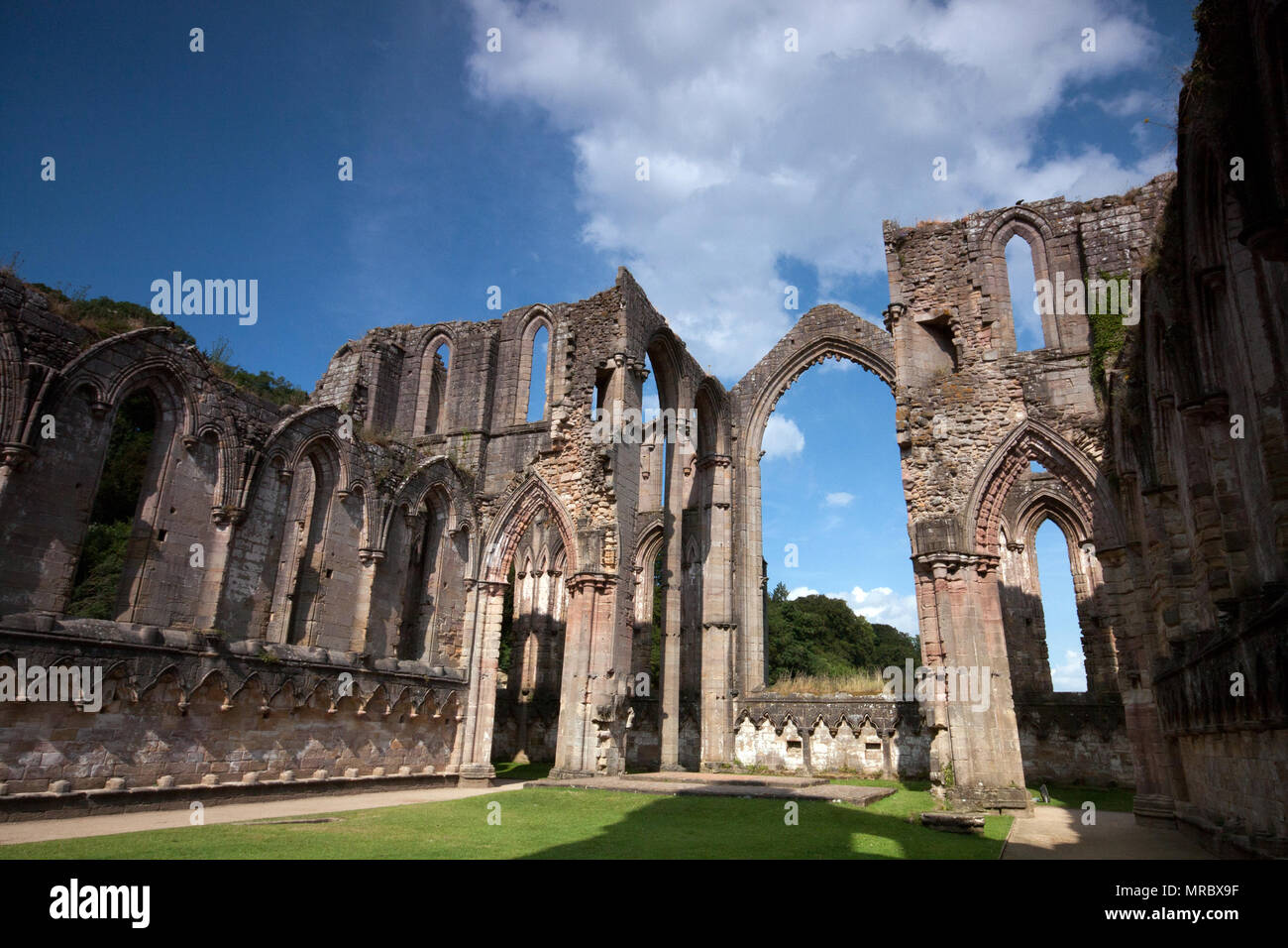 Architecture with tall gothic archs in the interior of the monastery ...