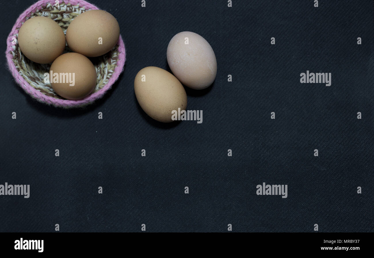 five eggs lays on nest on blackboard Stock Photo - Alamy