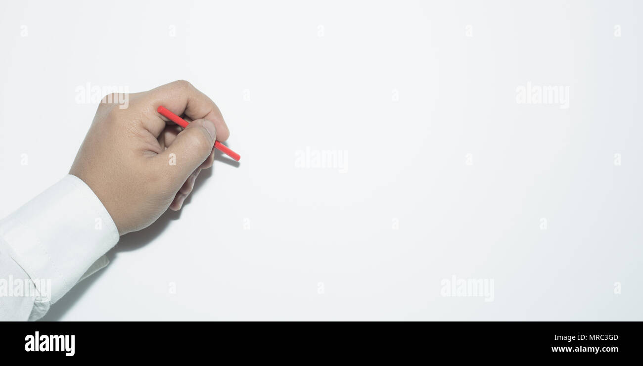 Businessman's hand writing something on a white wall Stock Photo - Alamy