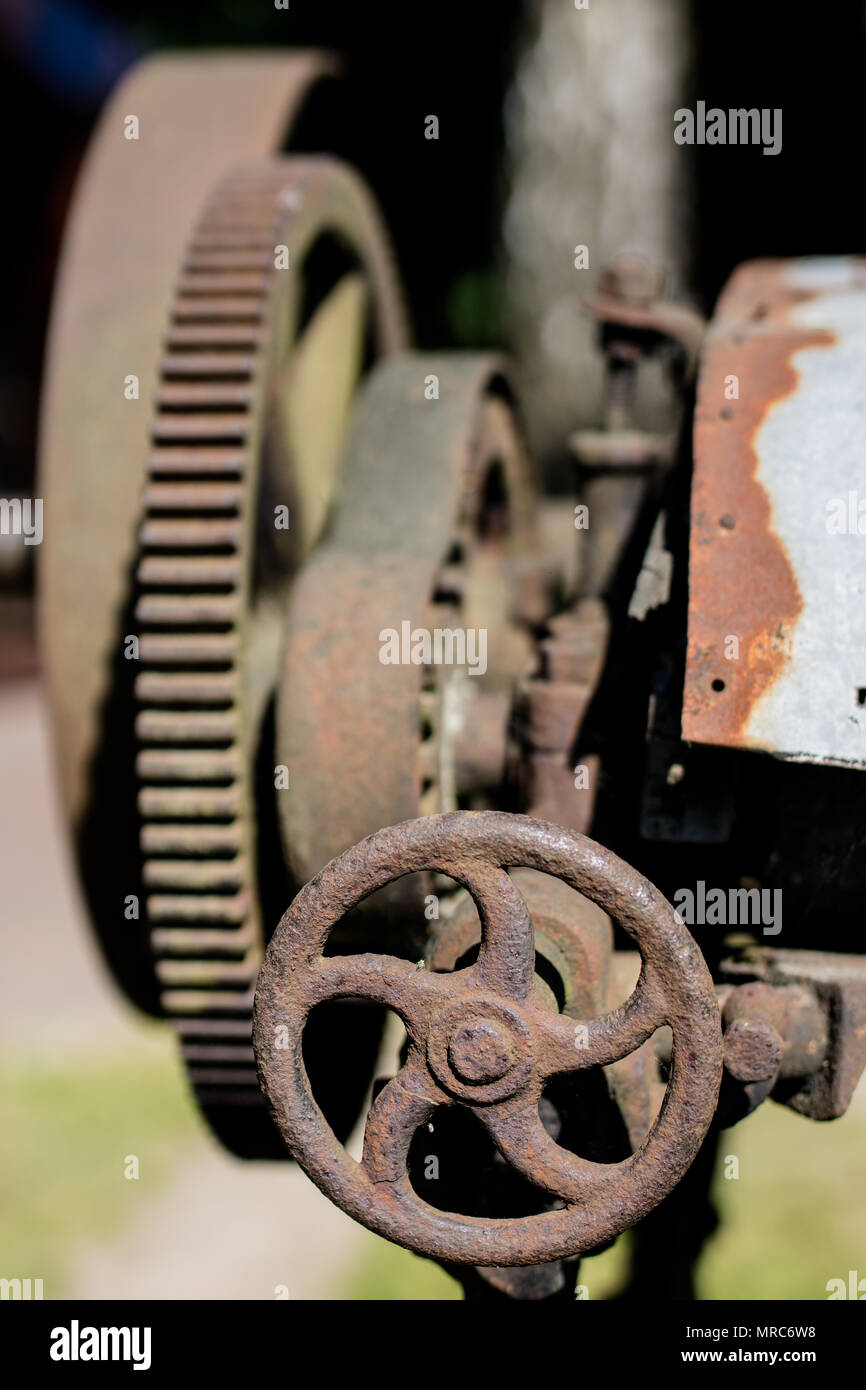 Old metal gears in drive mechanisms. Rusty gears used in machines from ...
