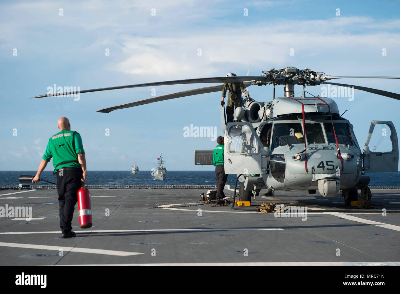 170603-N-PD309-128 GULF OF THAILAND (June 3, 2017) Sailors assigned to ...