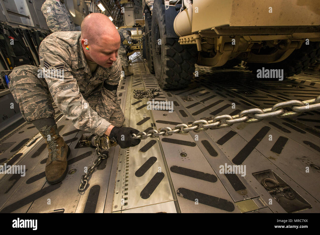 U.S. Air Force Aerial Porter Senior Airman Christopher E. Pavlik with ...