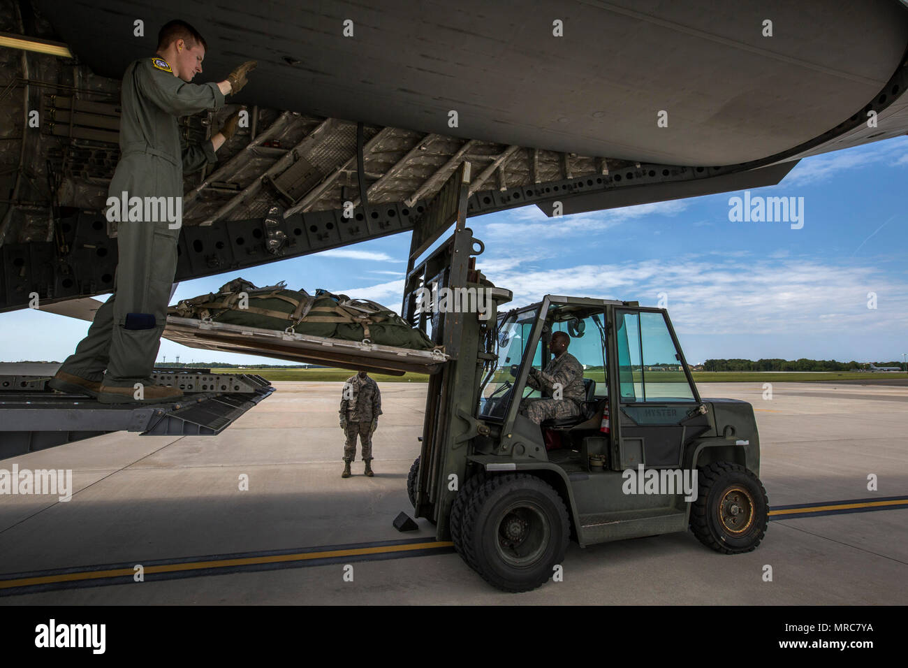 A U.S. Air Force Loadmaster with the 732nd Airlift Squadron, 514th Air ...