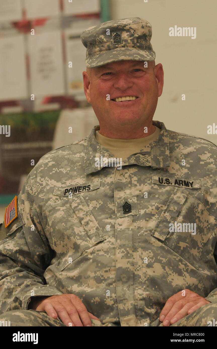 6/4/17 - Command Sgt. Maj. Reginald Powers listens during his change of ...
