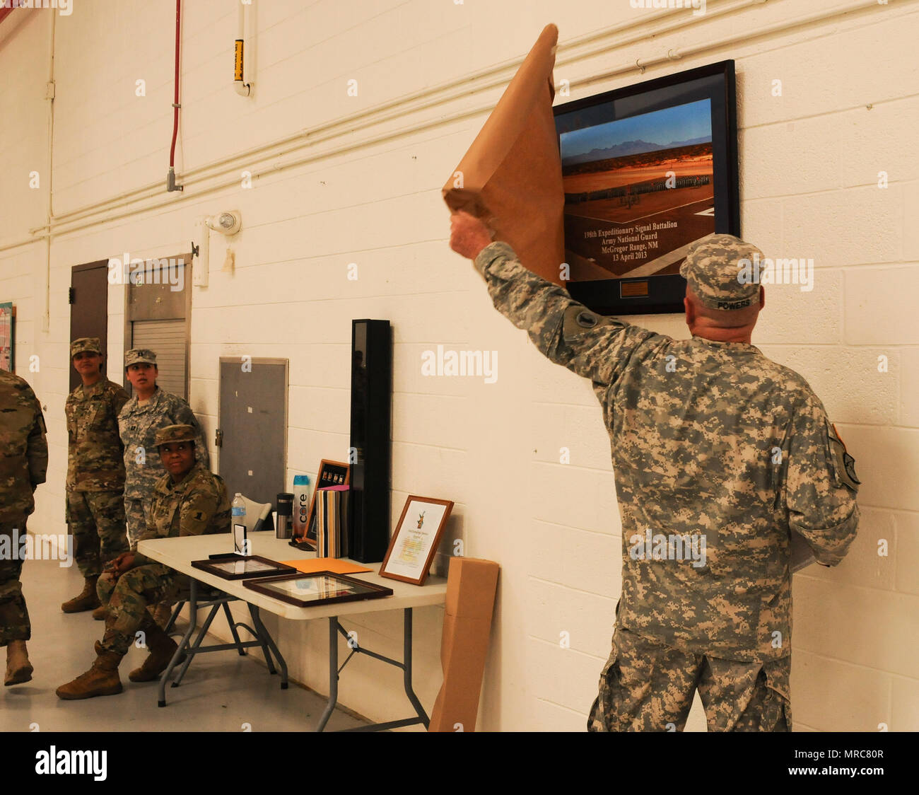 6/4/17 - Command Sgt. Maj. Reginald Powers unveils a framed picture of ...