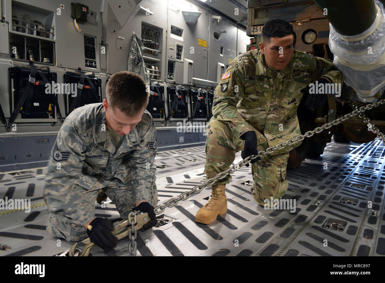 Air Force Staff Sgt. Robert Shepard (left) and Army Sgt. Eric Martinez ...