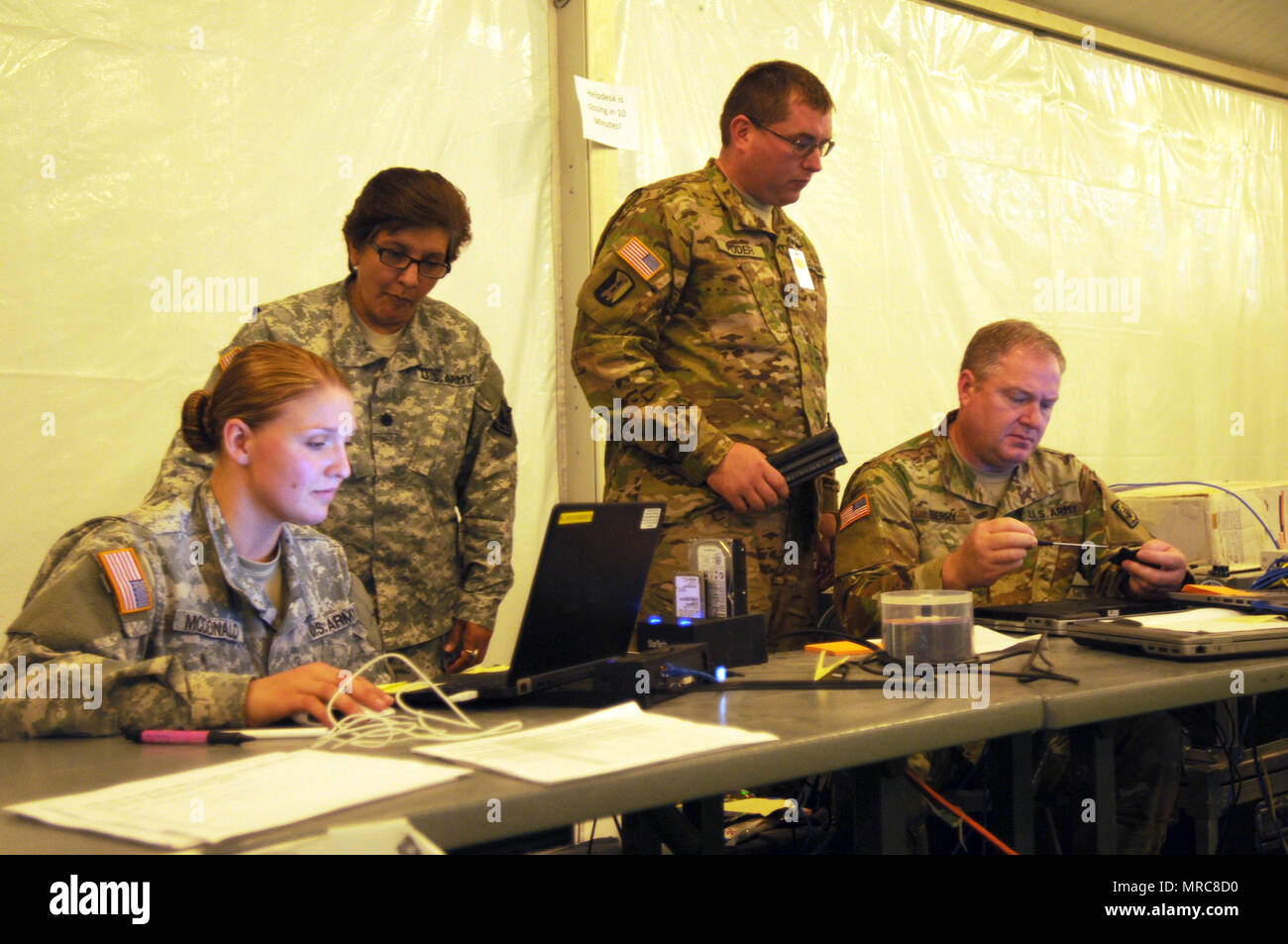 Sgt. Brittany Mitchell, Lt. Col. Anita Reyes, Staff. Sgt. Erik Puder ...