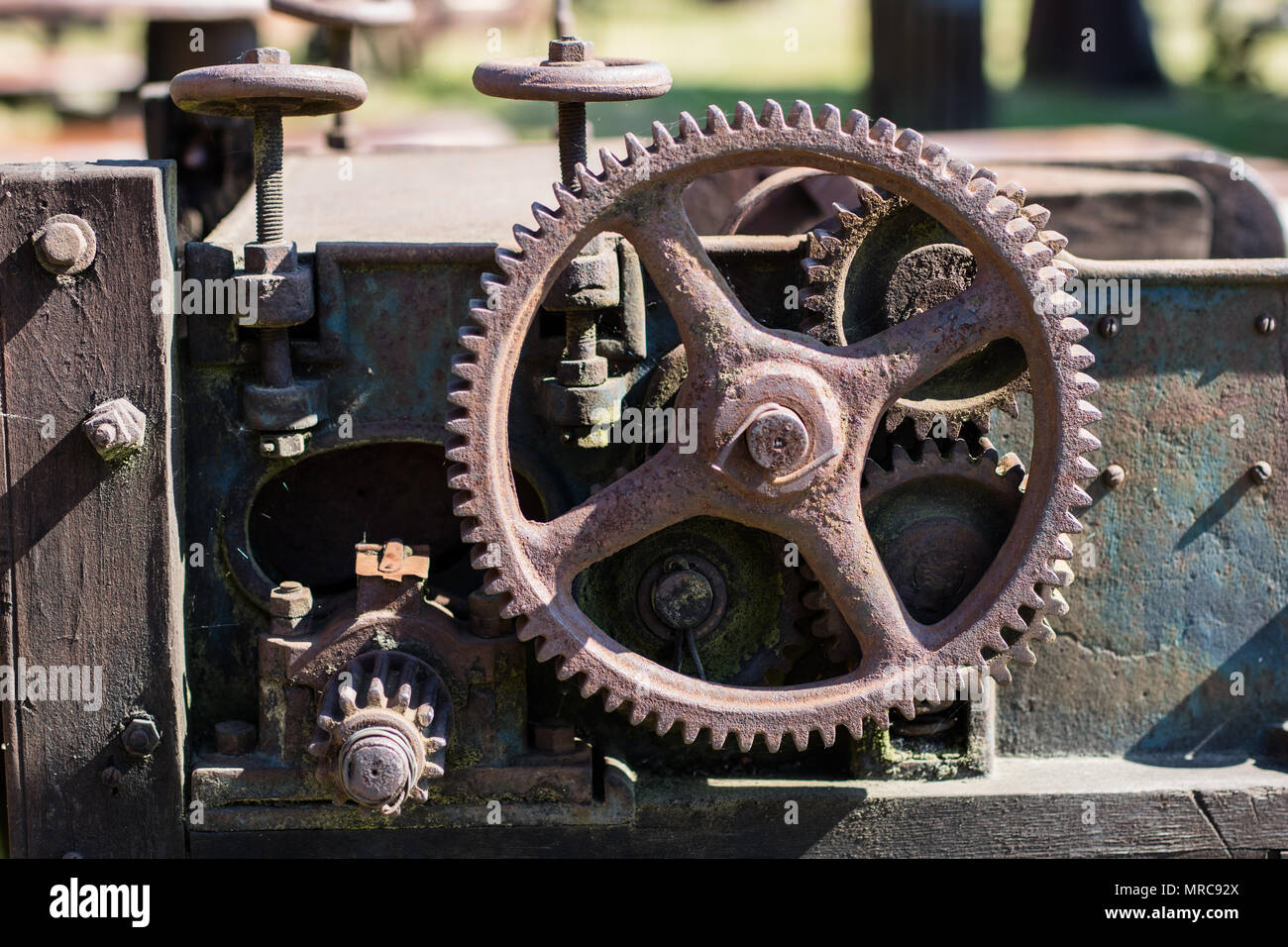 Old metal gears in drive mechanisms. Rusty gears used in machines from ...