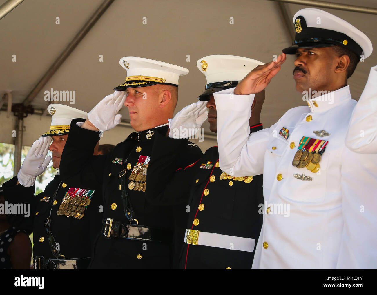 The Tri-command leadership salute during the national anthem during the ...