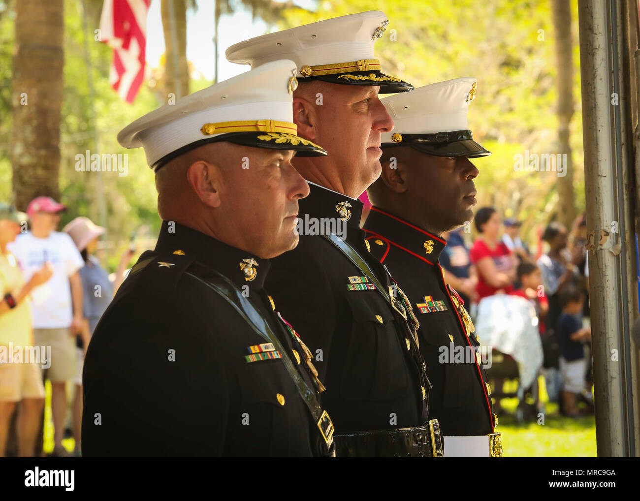 The Tri-command leadership stands for the Marine Corps Hymn during the ...