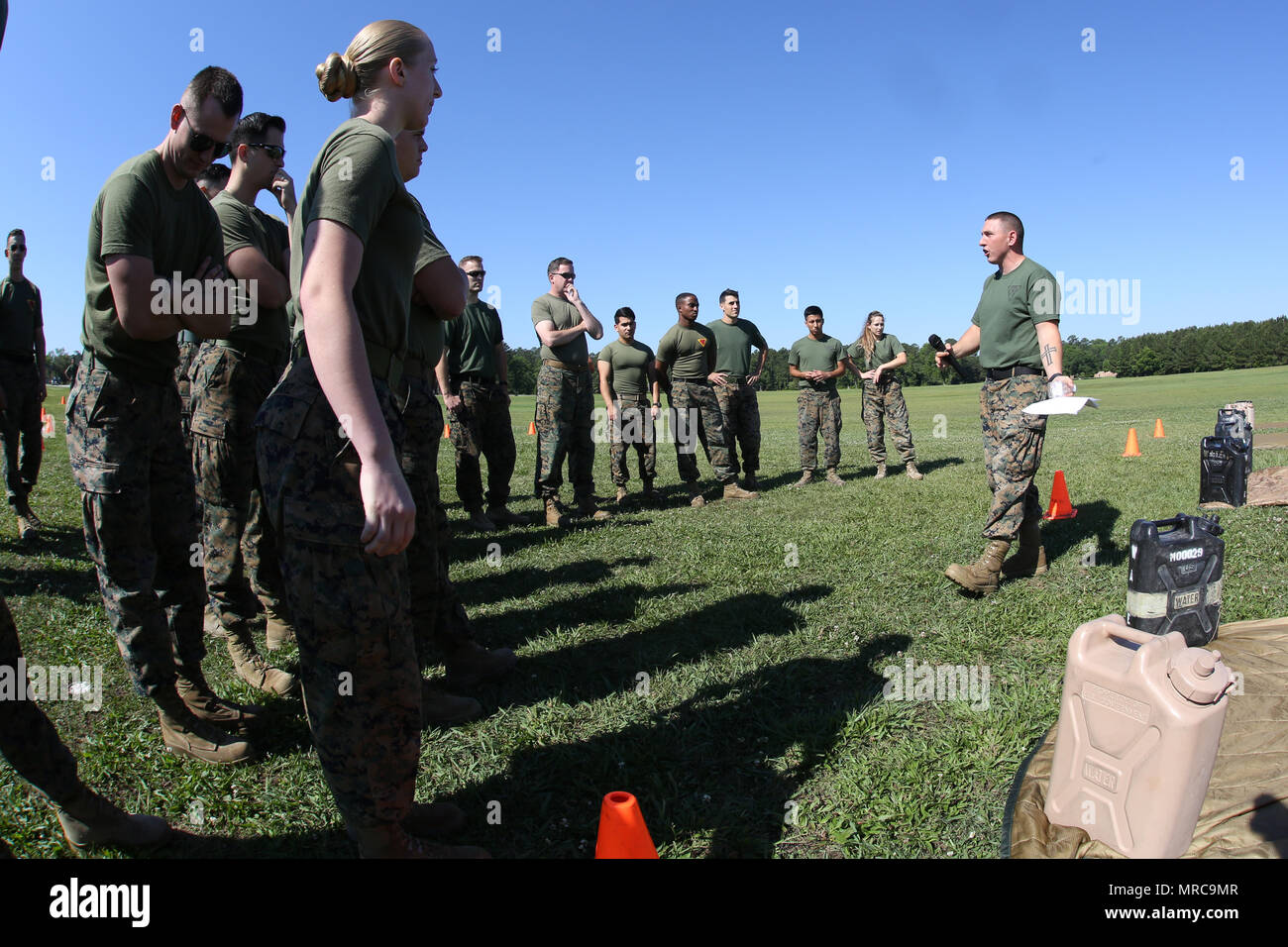 Gunnery Sgt. Anthony Stockman briefs a group of Marines assigned to ...