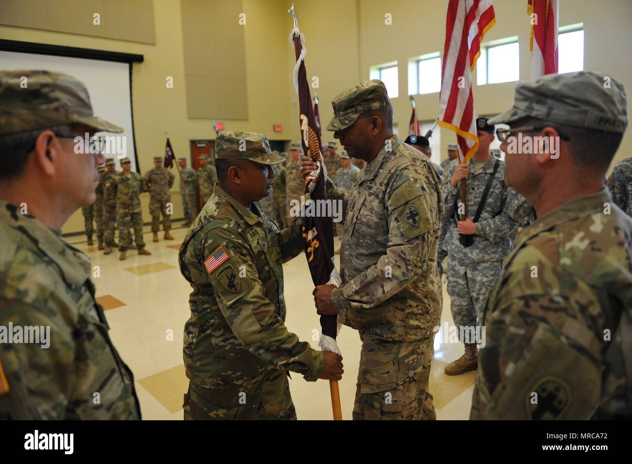Lt. Col. RC Chao transfers the colors to Command Sgt. Maj. Carlos ...