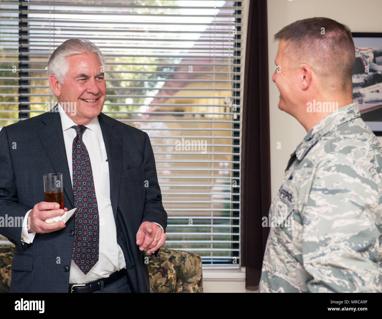 Secretary of State Rex Tillerson speaks with U.S. Air Force Col. Corwin ...