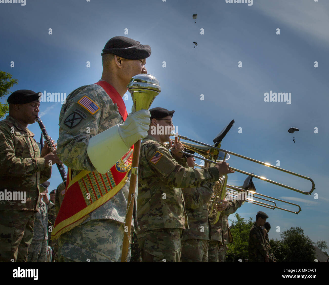 The USAREUR Band performs while soldiers of the 82nd Airborne division ...