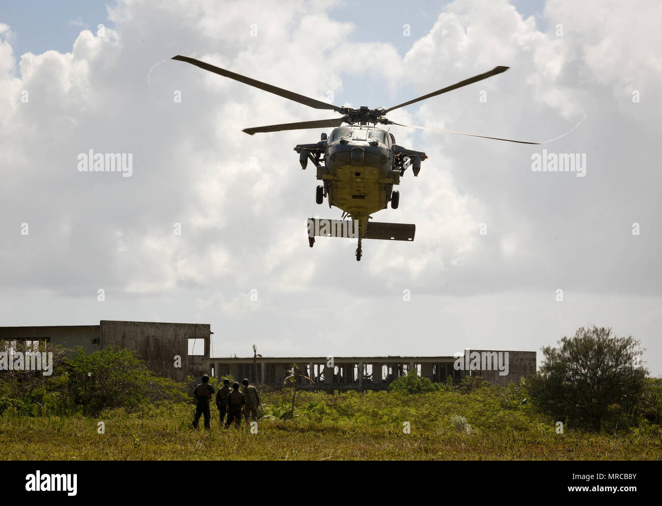 A U.S. Navy MH-60 Seahawk, assigned to Helicopter Sea Combat Squadron ...