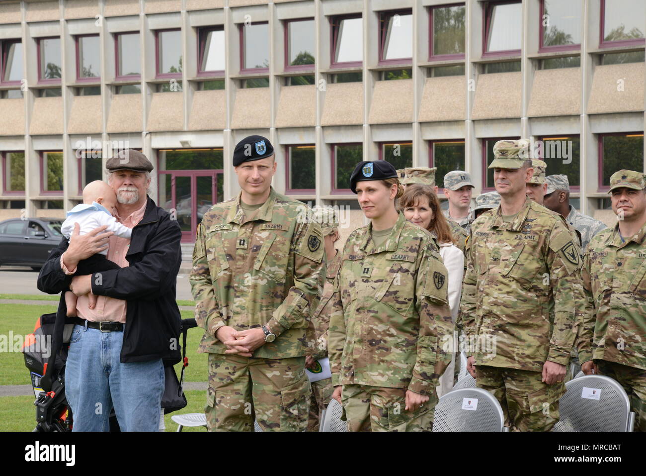 U.S. Army Cpt. Danielle K. Cork (outgoing Commander) with her husband ...