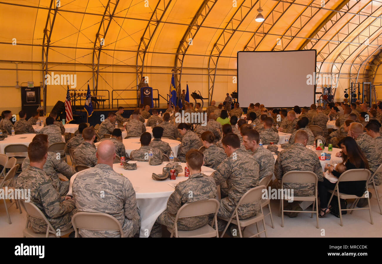 Maj. Gen. Jimmey R. Morrell awards banquet attendees watch a squadron ...