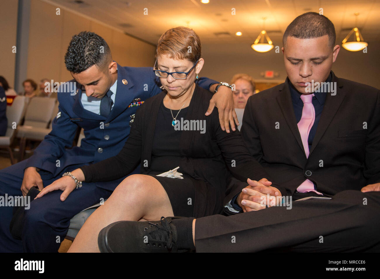 Mourners pray during a funeral for deceased Senior Airman Gabriel ...