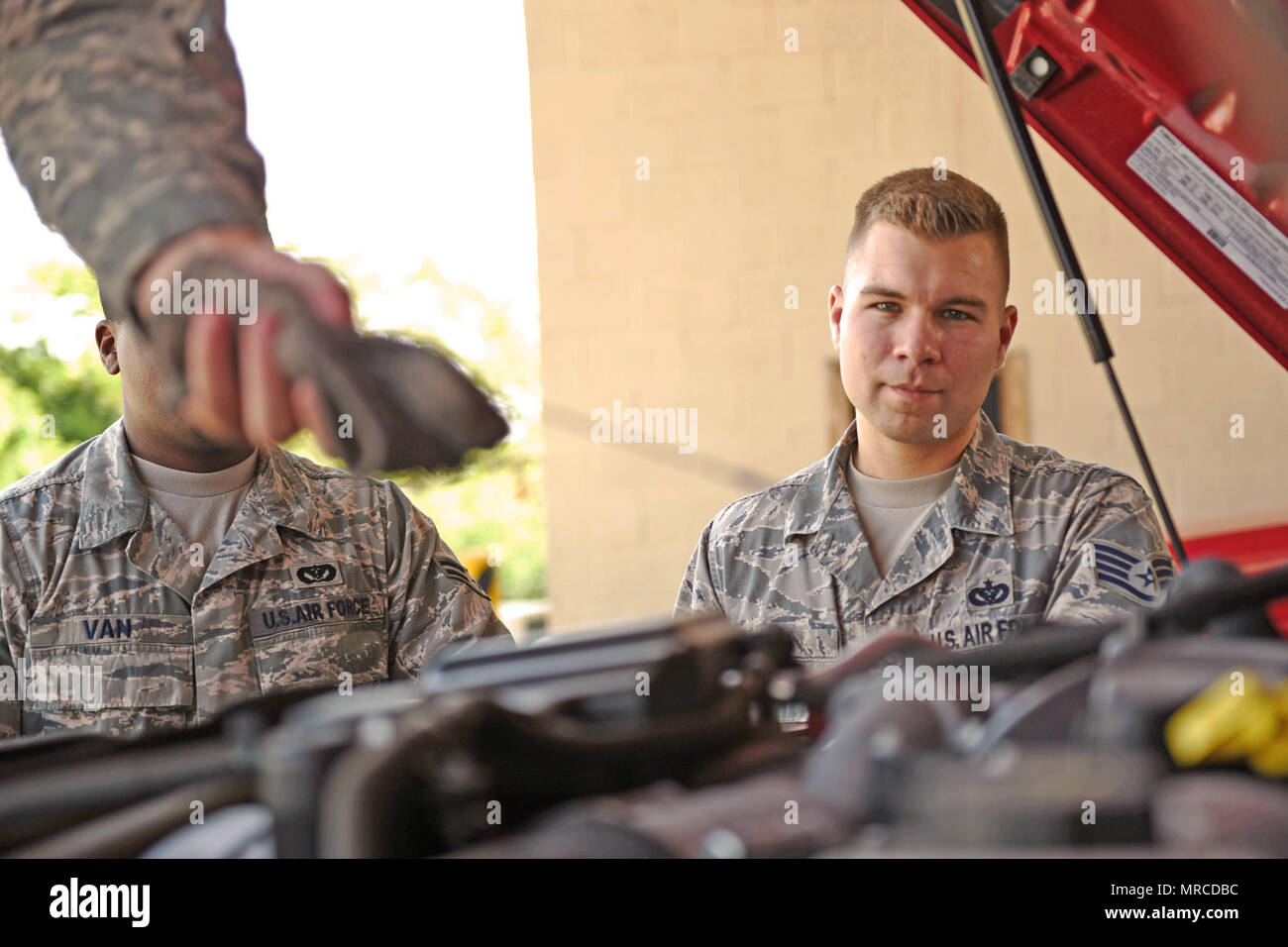 U.S. Air Force Staff Sergeant Zachary White (right), 612th Air Base ...