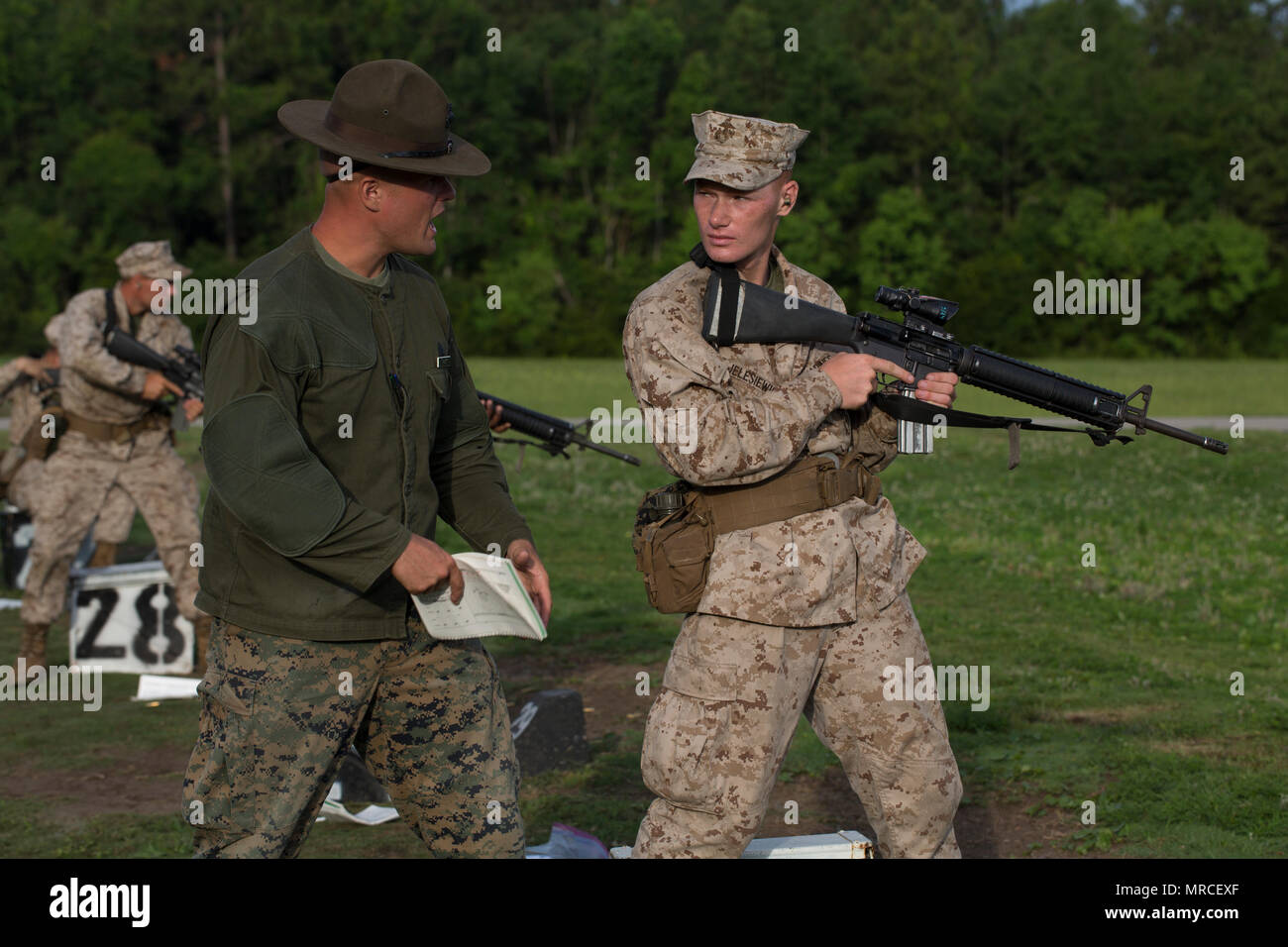 U.S. Marine Corps Sgt. Max Tackett, primary marksmanship instructor ...