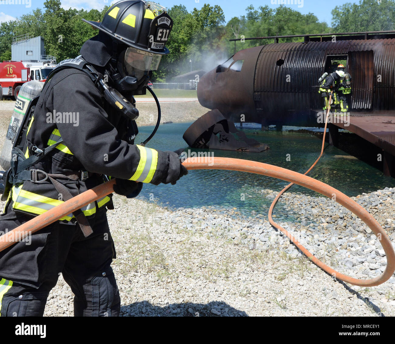 Davey Watson, 788th Civil Engineer Squadron firefighter, helps deploy ...