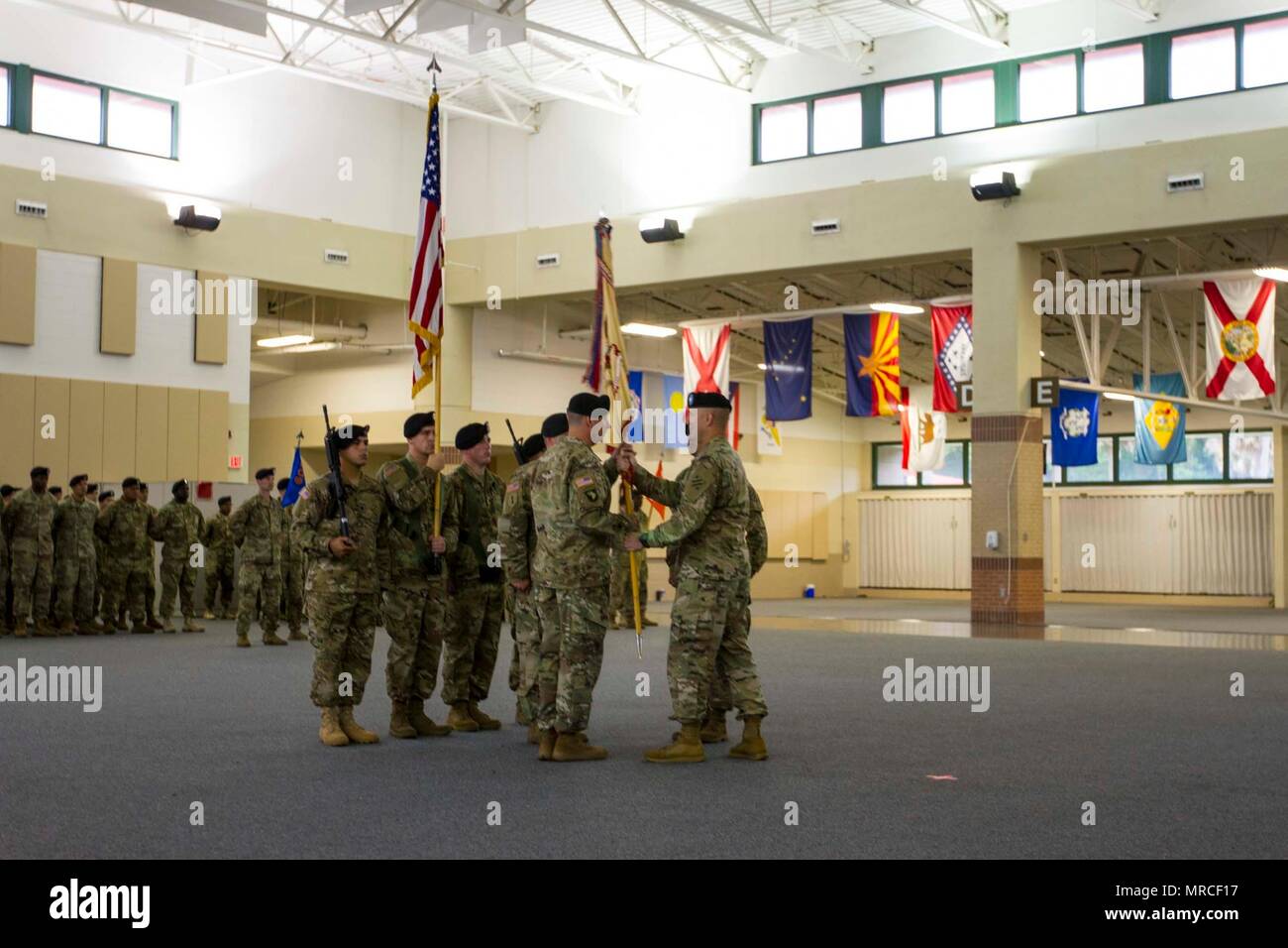 Col. Jeffrey A. Becker, commander, 3rd Combat Aviation Brigade hands ...