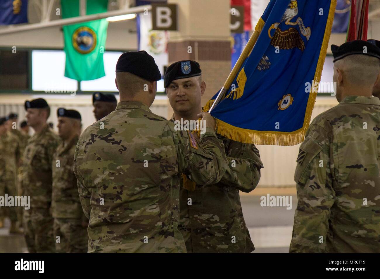 Col. Jeffrey A. Becker, commander, 3rd Combat Aviation Brigade hands ...