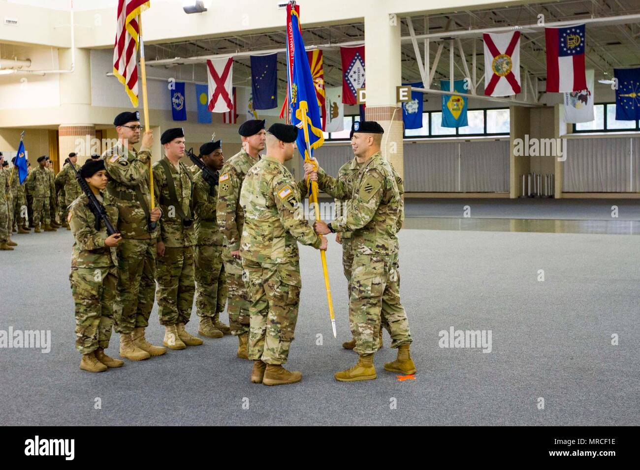 Col. Jeffrey A. Becker, commander, 3rd Combat Aviation Brigade hands ...