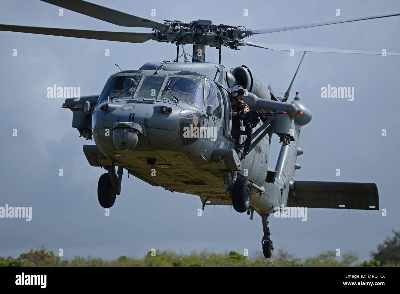 A U.S. Navy MH-60 Seahawk, assigned to Helicopter Sea Combat Squadron ...